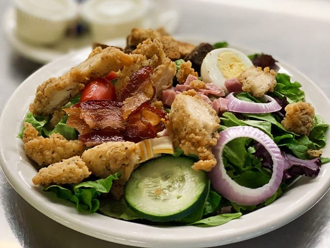 Even the salads here mean business, loaded with crispy chicken and bacon because vegetables deserve good company too.
