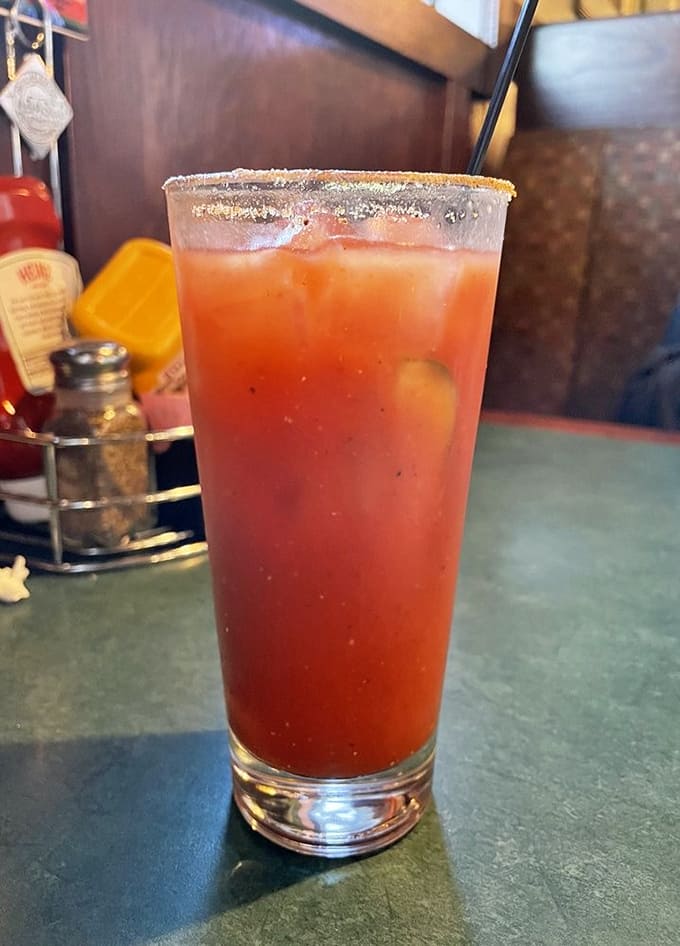 A properly garnished Bloody Mary with a salted rim stands ready to complement your meal or serve as liquid courage for wing-eating competitions.