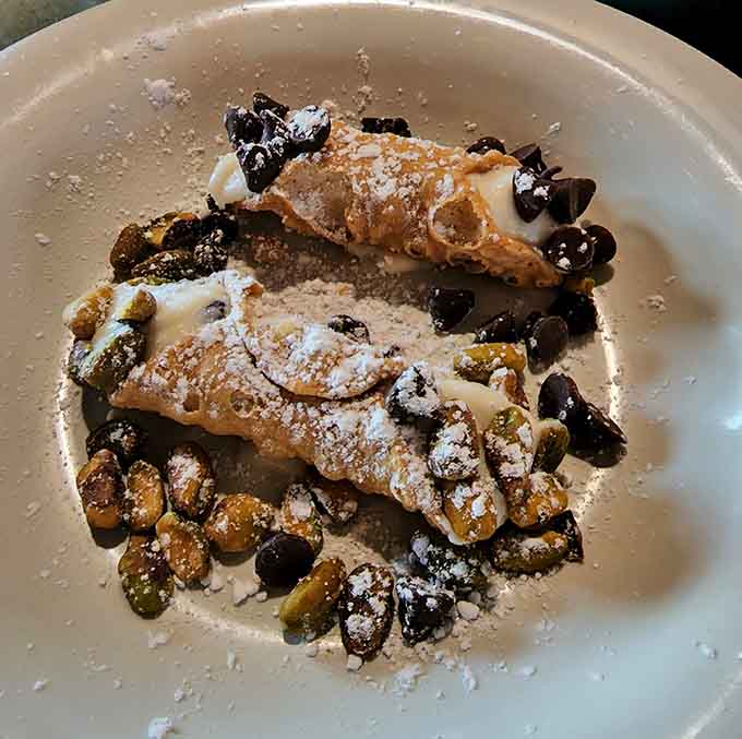 Crispy cannoli shells filled with sweet ricotta provide the perfect ending, because every great pizza meal deserves an equally great finale.