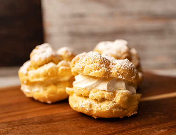 Cream puffs that are basically edible clouds, light and airy with just the right amount of sweet filling.