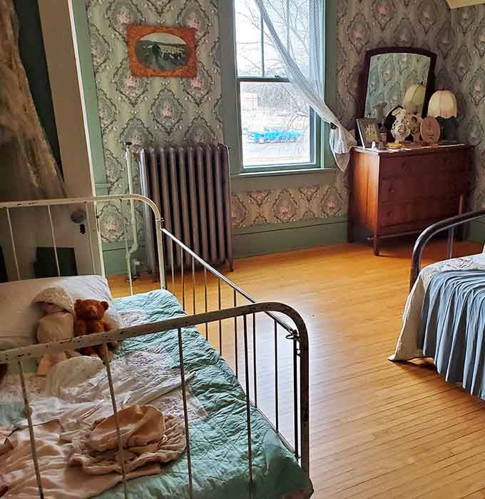 Twin beds and vintage toys recreate a childhood bedroom where dreams of stardom first took flight on Minnesota nights.