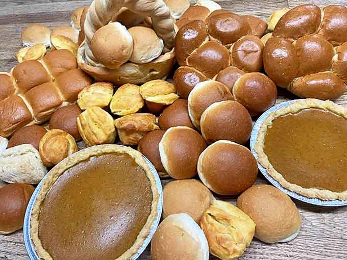 Buns: A bread family reunion where everyone showed up &ndash; dinner rolls, sandwich buns, and those pumpkin pies watching from the corner like proud aunties.