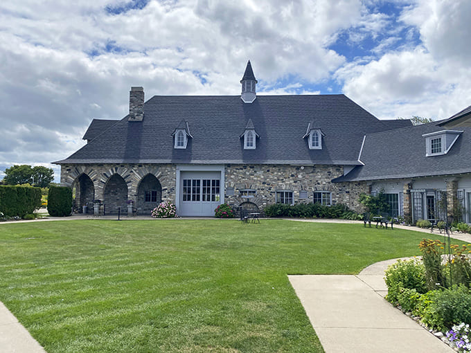 The Knight's Courtyard welcomes visitors with open arms and perfect landscaping, proving that even knights appreciate a well-maintained lawn.