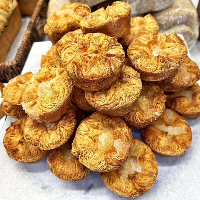 Kouign Amann &ndash; the caramelized Breton pastry that looks like a simple muffin but tastes like butter transformed into candy by some magical alchemy.