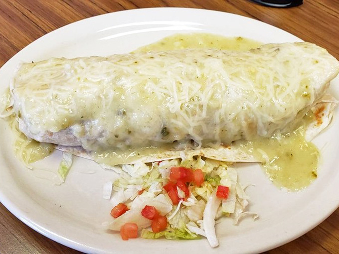 This green enchilada burrito demonstrates the restaurant's commitment to generous portions and house-made sauces that elevate every dish.