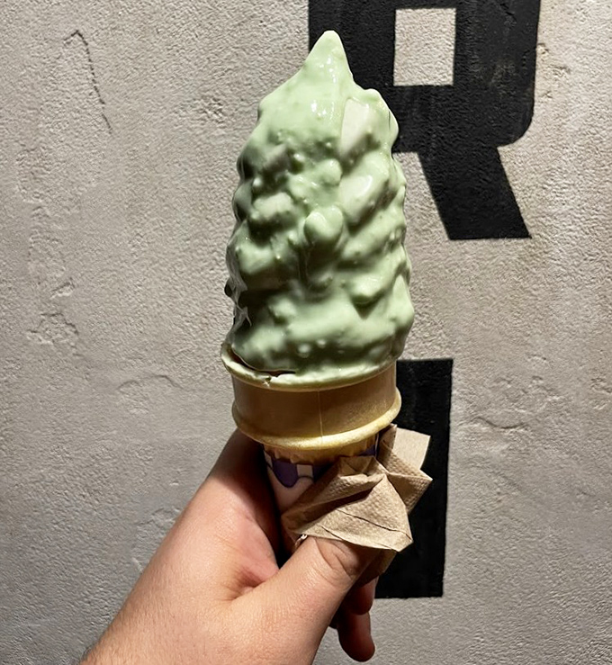 Pistachio soft serve that's creamy, nutty perfection - a rare treat that locals know to grab when available.