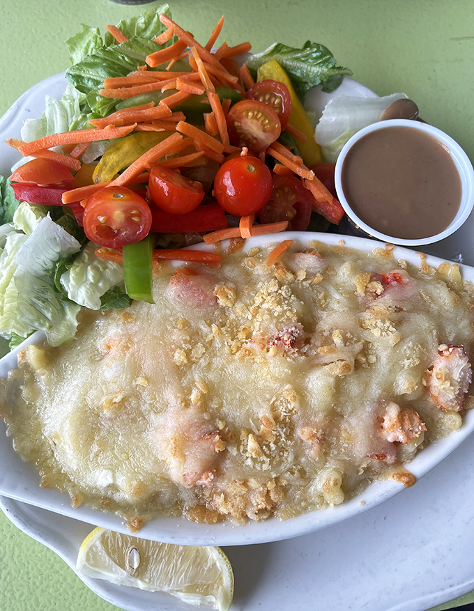 Decadence defined: creamy cheese sauce embraces tender pasta and sweet lobster chunks, all crowned with golden breadcrumbs &ndash; comfort food elevated to art form.