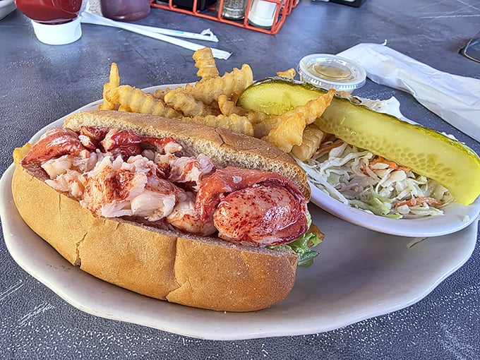 A lobster roll that needs no introduction &ndash; chunks of sweet meat barely dressed, tucked into a perfectly toasted bun that's ready for its close-up.