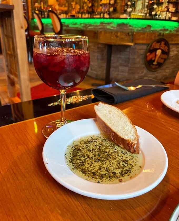 House-made sangria and warm bread with herb-infused olive oil start your meal right, setting the stage for the pasta parade that's about to arrive.