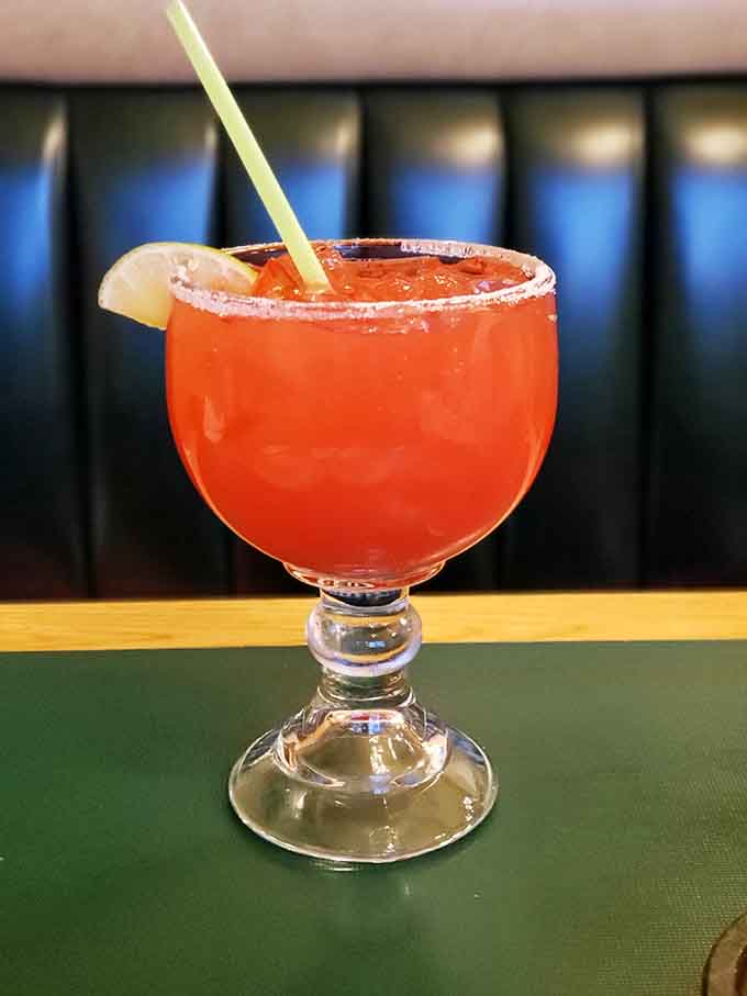 This strawberry margarita with its salt-rimmed glass looks like vacation in a cup, minus the sunburn and the overpriced resort fees.