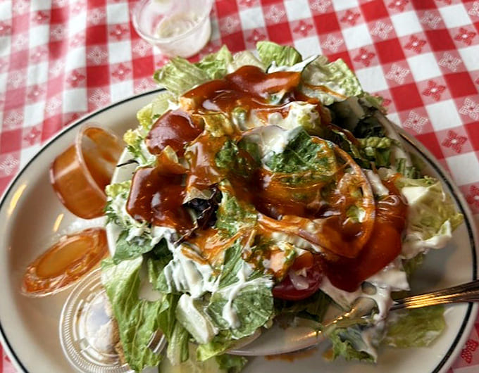 Even the salads get the barbecue treatment here, topped with strips of smoked meat because vegetables need protein too.