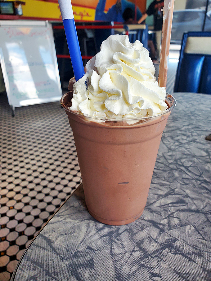 Thick enough to require both straw and spoon – this isn't just a milkshake, it's a commitment to creamy, old-fashioned indulgence.