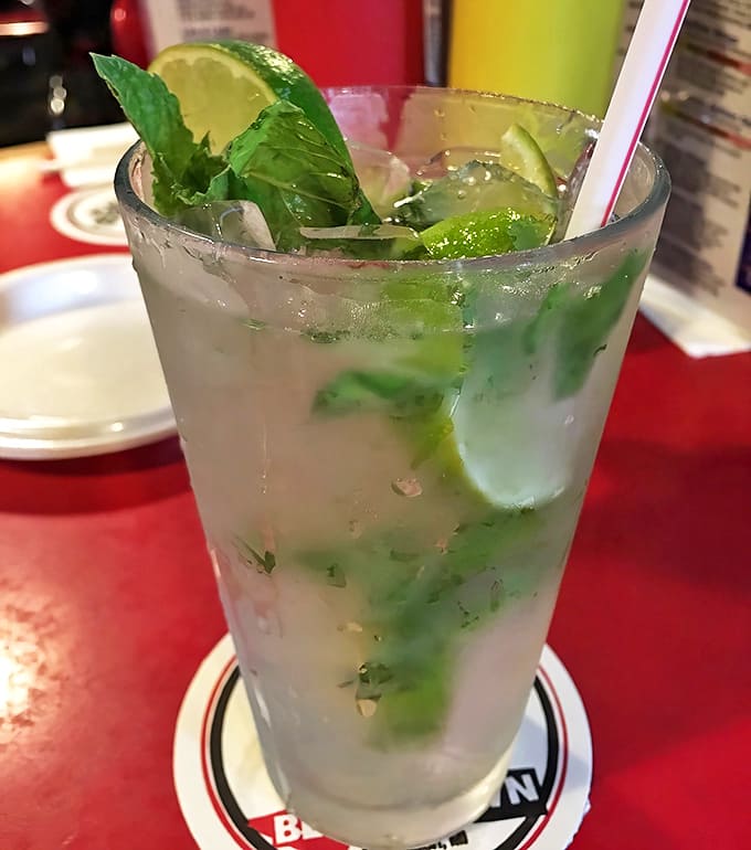 Mojito Cocktail: Fresh mint and lime dance in perfect harmony, like summer in a glass. Who knew Michigan could feel so tropical?