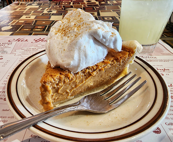 Another angle on that legendary pumpkin pie &ndash; notice the perfect spice distribution and cloud-like whipped cream.