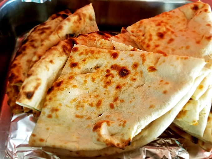 Naan shall pass... without trying these pillowy delights! Tandoor's bread is the perfect curry companion and napkin in one.