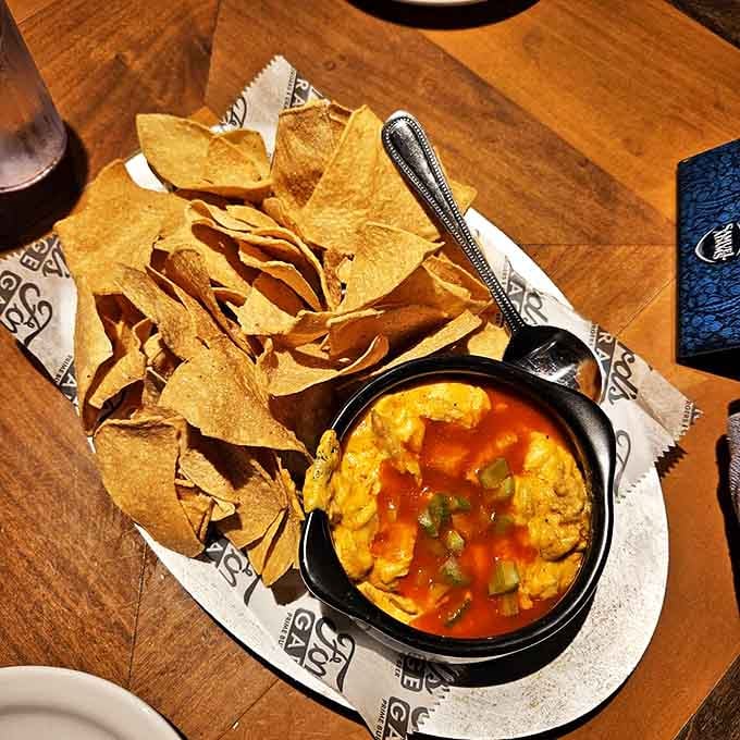 These nachos aren't just an appetizer &ndash; they're a social event, with buffalo chicken dip waiting to be discovered like hidden treasure.