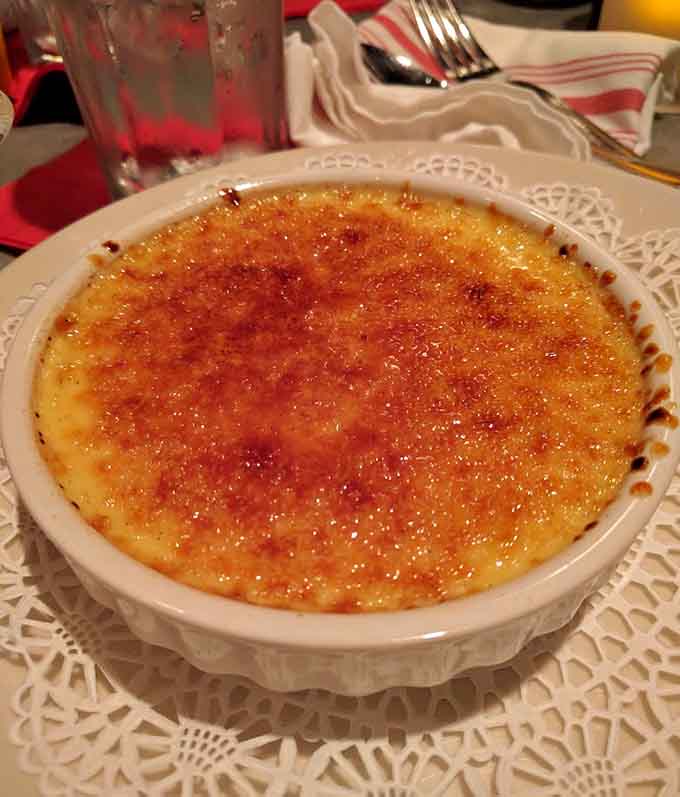 Crème brûlée with that satisfying crack when you break through the caramelized top, revealing silky custard that'll convert dessert skeptics.