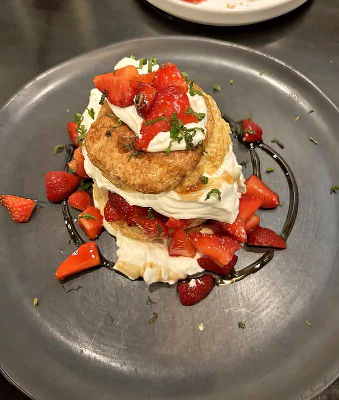 Strawberry shortcake deconstructed and elevated, because even dessert gets the gourmet treatment here.