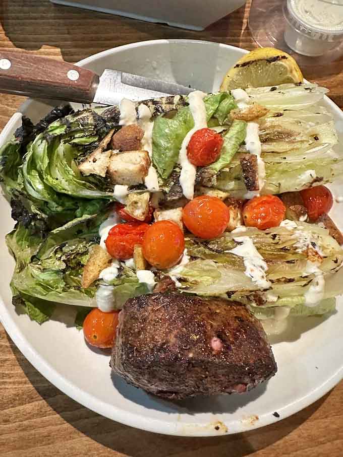 This Caesar salad is a study in how to do classics right, with grilled romaine and perfectly charred tomatoes elevating familiar flavors.