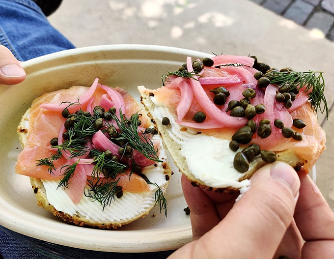 Ocean meets garden in this elegant arrangement of salmon, capers, dill, and pickled onions &ndash; edible artwork at its finest.
