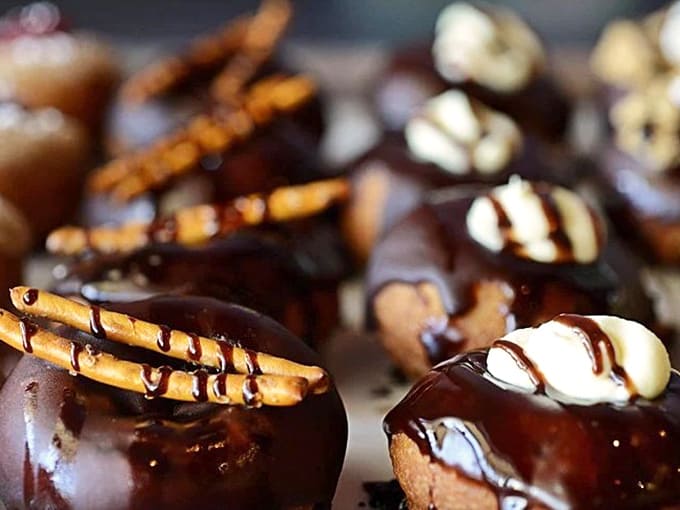 Chocolate lovers, prepare to swoon! These decadent creations feature rich chocolate glaze, drizzles, and toppings for maximum cocoa bliss.