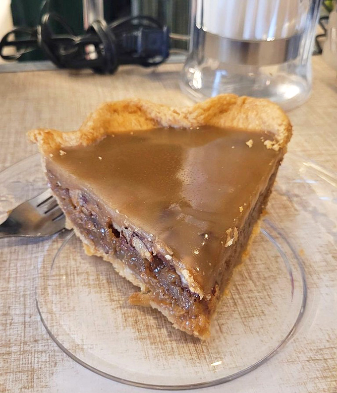 Pecan pie that makes you question if you've ever really had pecan pie before, gooey, rich, and utterly transcendent.