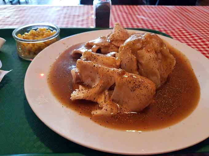 Sliced turkey swimming in savory gravy, the kind of plate that reminds you why simple classics never go out of style.