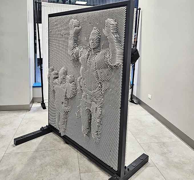 The Pin Art board creates 3D impressions of whatever presses against it. It's like a high-five that remembers you long after you've walked away.