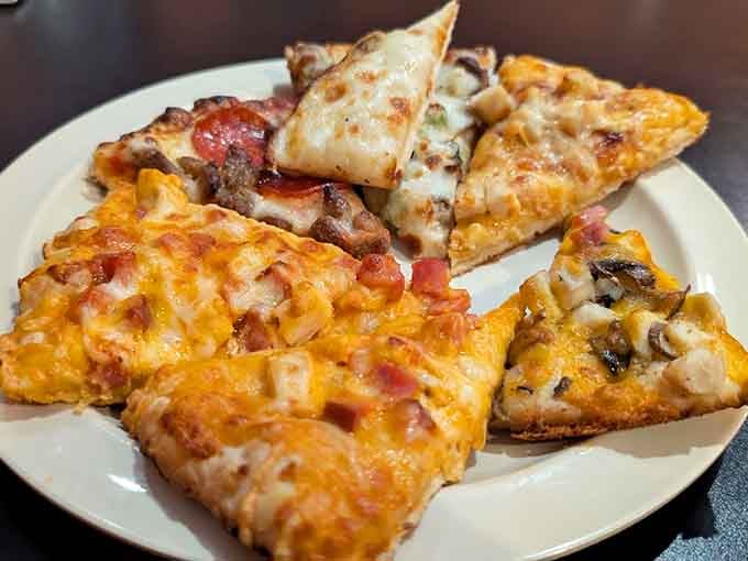 A pizza sampler that looks like it's auditioning for a food magazine cover, each slice telling its own delicious story.