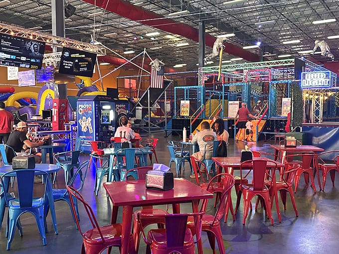 The colorful seating area offers parents a strategic vantage point to rest weary legs while maintaining sight lines to active offspring.