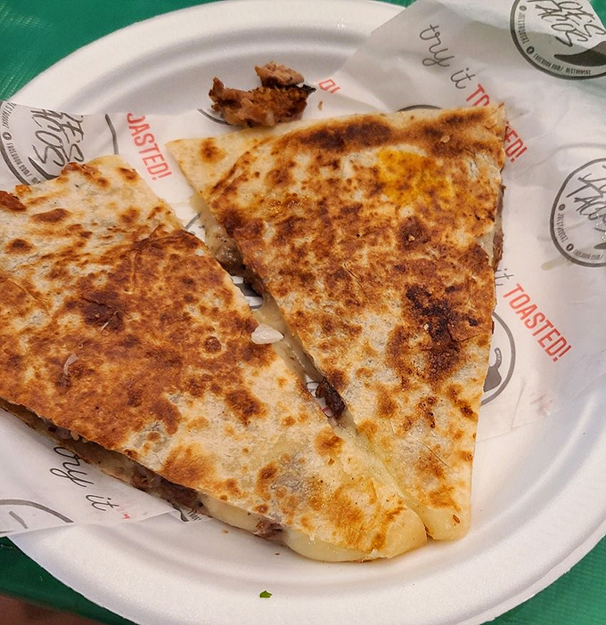 Quesadilla: Golden-brown perfection with cheese that stretches dramatically with each bite &ndash; the kind of simple pleasure that makes life worth living.