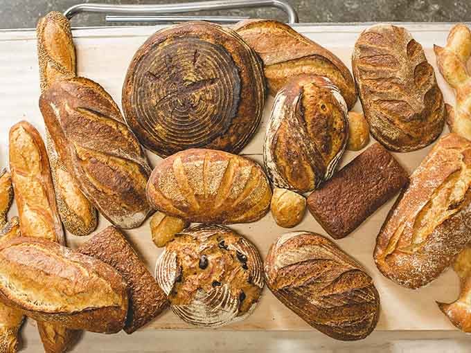 This bread display showcases the serious sourdough game happening here, with loaves that have crusts you can actually hear crackling from across the room.