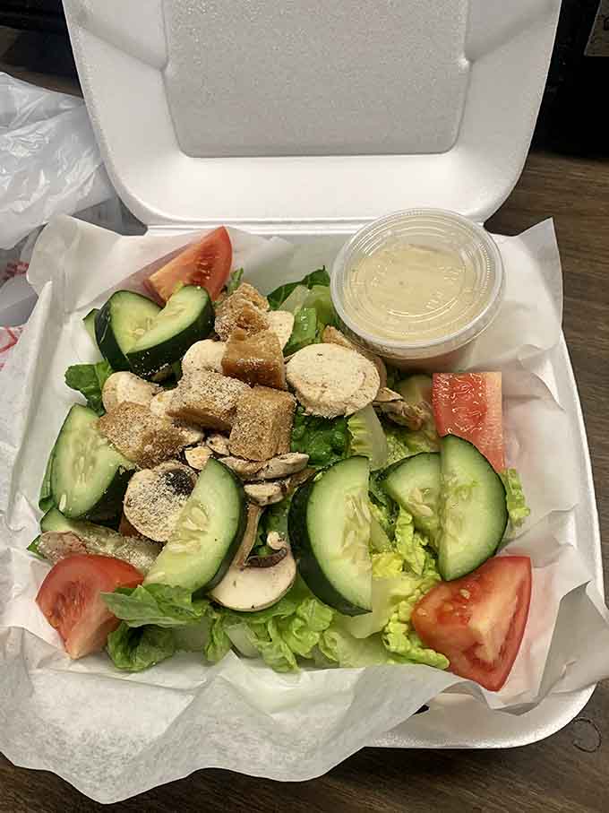 Even the salad gets respect here, fresh vegetables and real toppings for those rare moments when you choose virtue over beef.