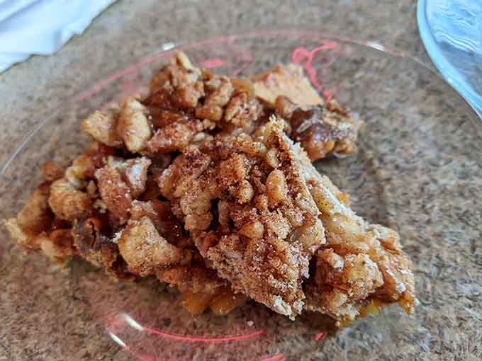 Apple pie with crumb topping so good, it makes you question every other dessert decision you've ever made.