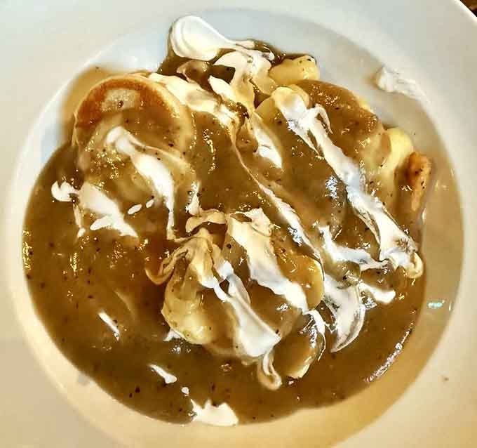 Pierogi poutine combines Canadian comfort with Polish tradition, creating gravy-covered, cheese-curd-topped perfection on a plate.