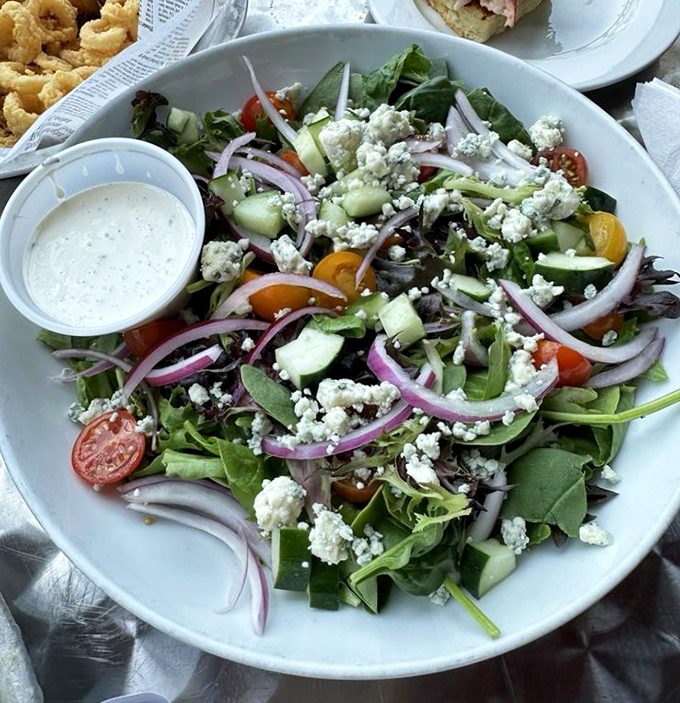 Even the salads shine at Robert's &ndash; crisp greens, vibrant vegetables, and tangy dressing create the perfect palate cleanser between seafood indulgences.
