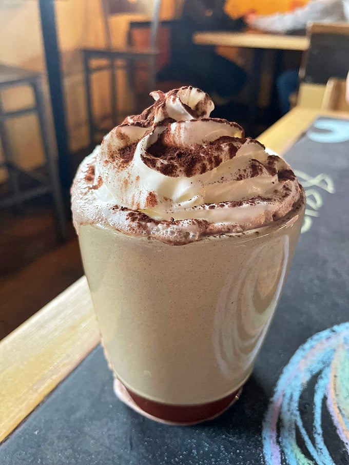 Topped with a cloud of whipped cream and dusted with cocoa, this shake isn't just a drink &ndash; it's a dessert with aspirations.