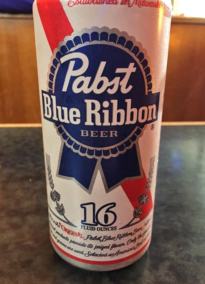 Nothing says "I'm having a good time" quite like a cold Pabst Blue Ribbon alongside your burger masterpiece.
