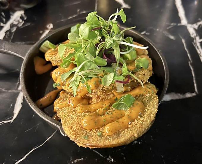Fried green tomatoes topped with enough deliciousness to make you forget tomatoes are technically a fruit.