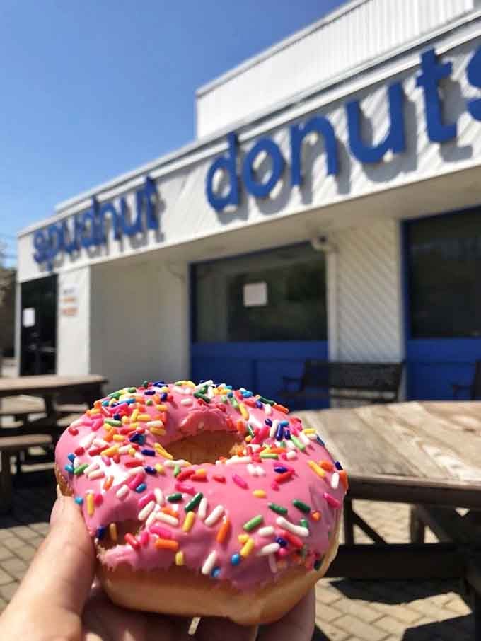 Strawberry frosted with rainbow sprinkles brings pure joy in circular form, like a party your taste buds actually want to attend.