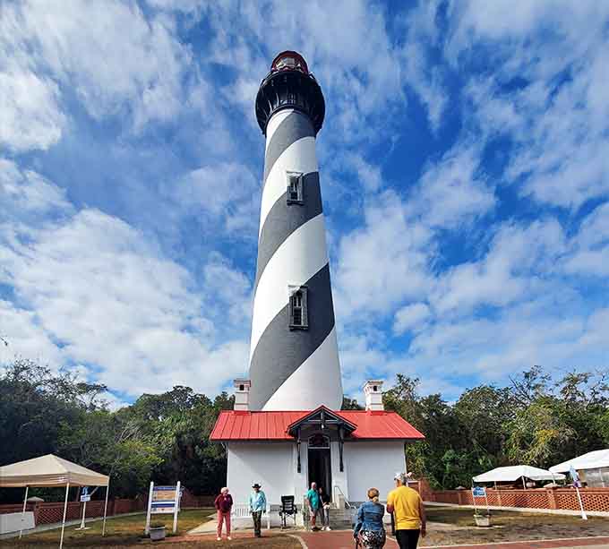 Climb 219 steps for views that'll make your calves burn and your camera roll explode, those black and white stripes are iconic for good reason.