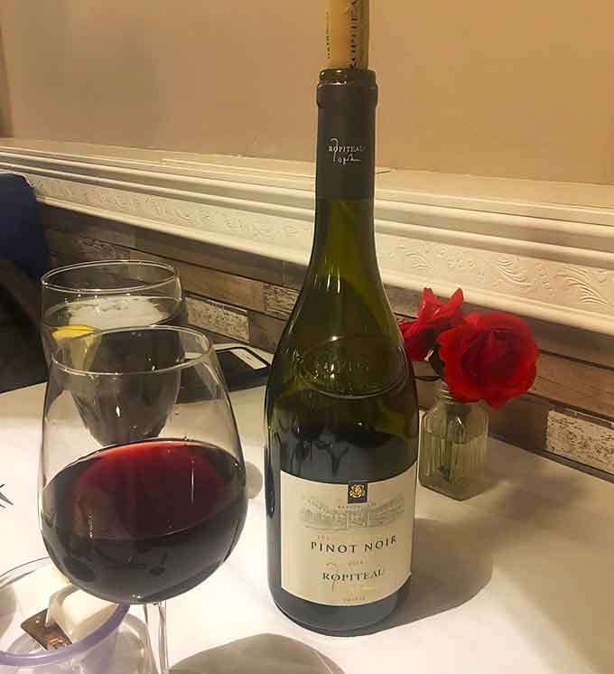 Quality wine selections like this Pinot Noir prove that thoughtful beverage pairings matter just as much as the food.