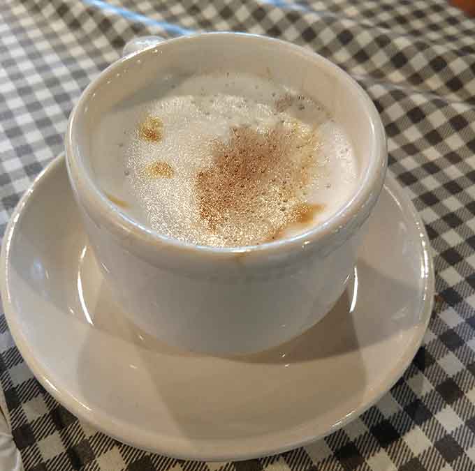 A perfectly crafted macchiato that pairs beautifully with pastries and makes you want to linger for another hour or two.