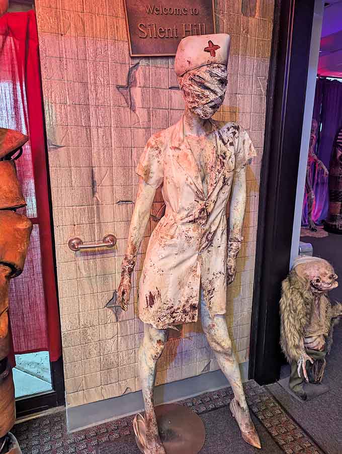 Silent Hill's most disturbing resident stands guard, reminding visitors that video game horror deserves respect too.