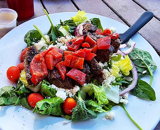 This salad manages to look virtuous and delicious simultaneously, proving healthy choices don't have to feel like punishment before the main event.