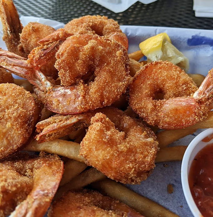 These golden shrimp are so perfectly crispy and plump, they could make a seafood skeptic reconsider their entire life philosophy immediately.