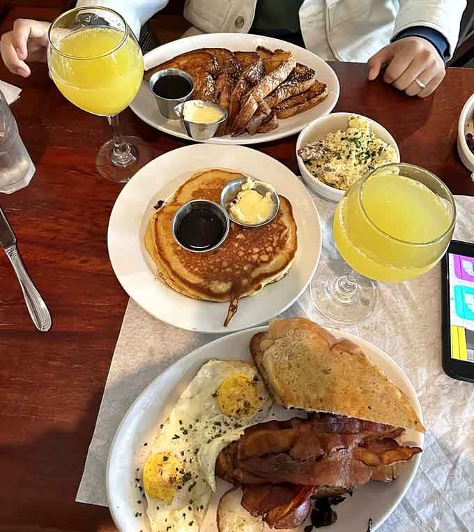 The dining room hums with the happy energy of people discovering their new favorite breakfast spot.