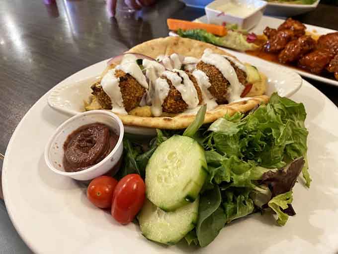 Falafel pita proves vegetarian options can be just as satisfying, packed with flavor and fresh vegetables that actually crunch.