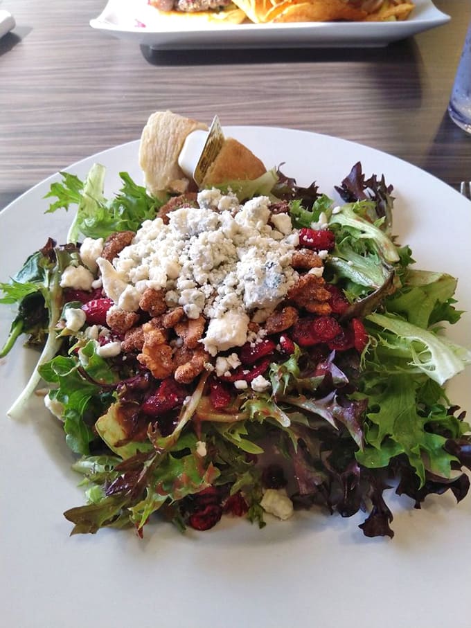 This walnut cranberry salad looks almost too pretty to eat, with its jewel-toned berries and generous cheese crumbles throughout.