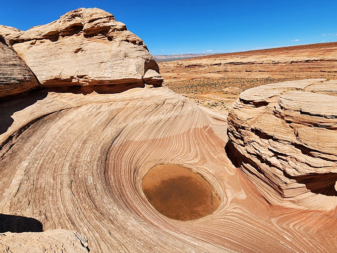 Mother Nature's abstract art gallery: swirling sandstone patterns that would make Salvador Dal&iacute; jealous.